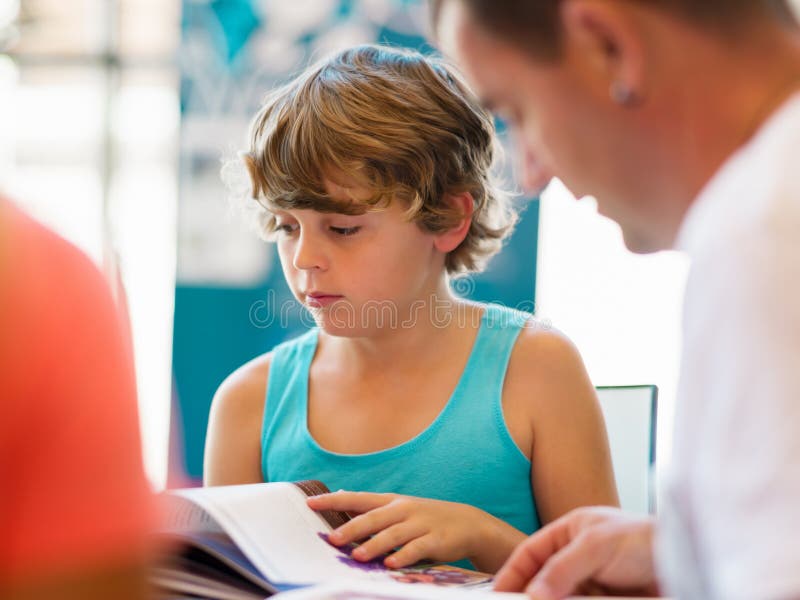 Family in library stock photo. Image of portrait, education - 54705372