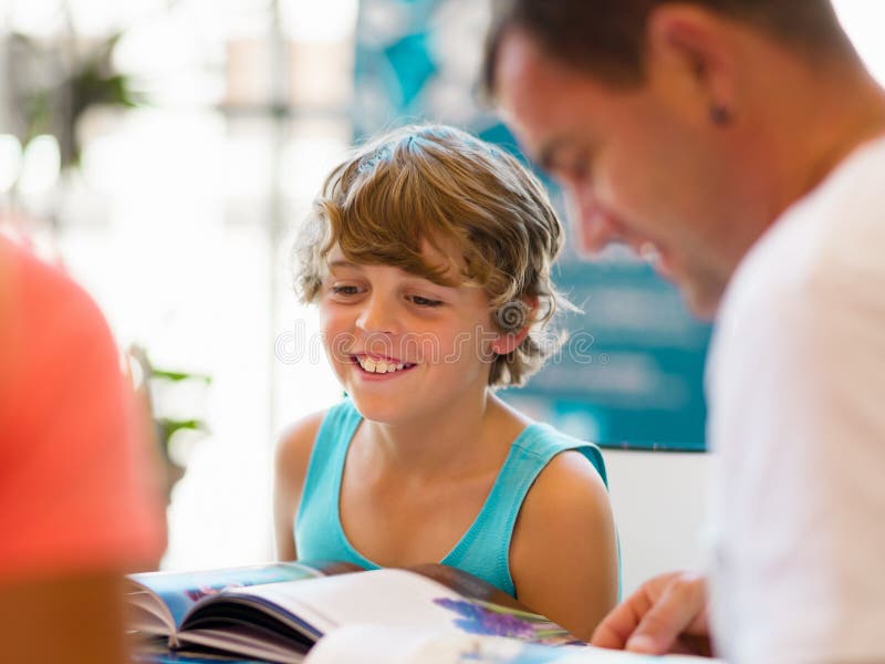 Family in library stock photo. Image of girl, literature - 55899818