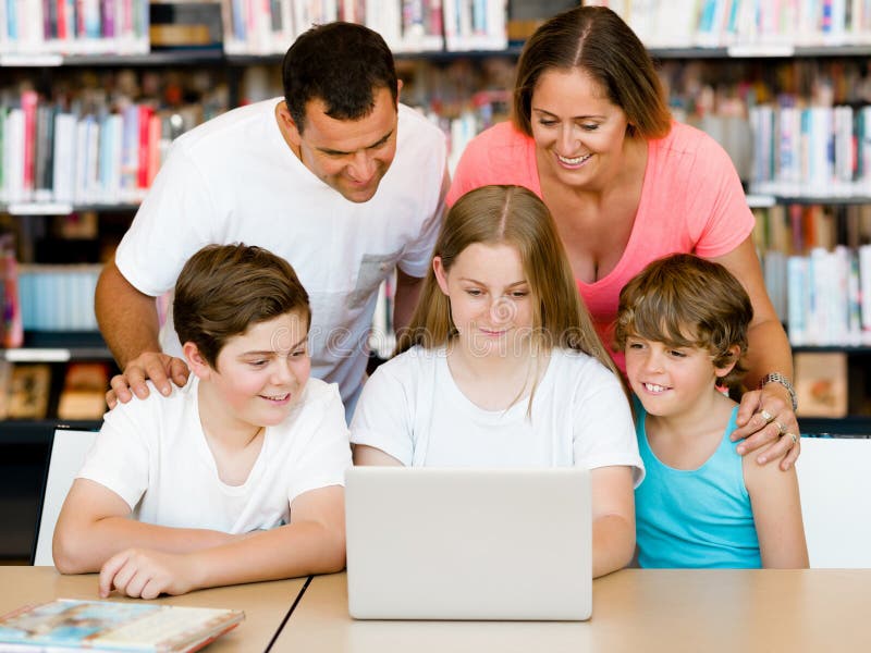 Family in library stock photo. Image of happy, portrait - 56147396