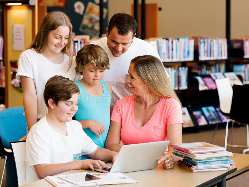 Family in the Library stock image. Image of girl, look - 10933449