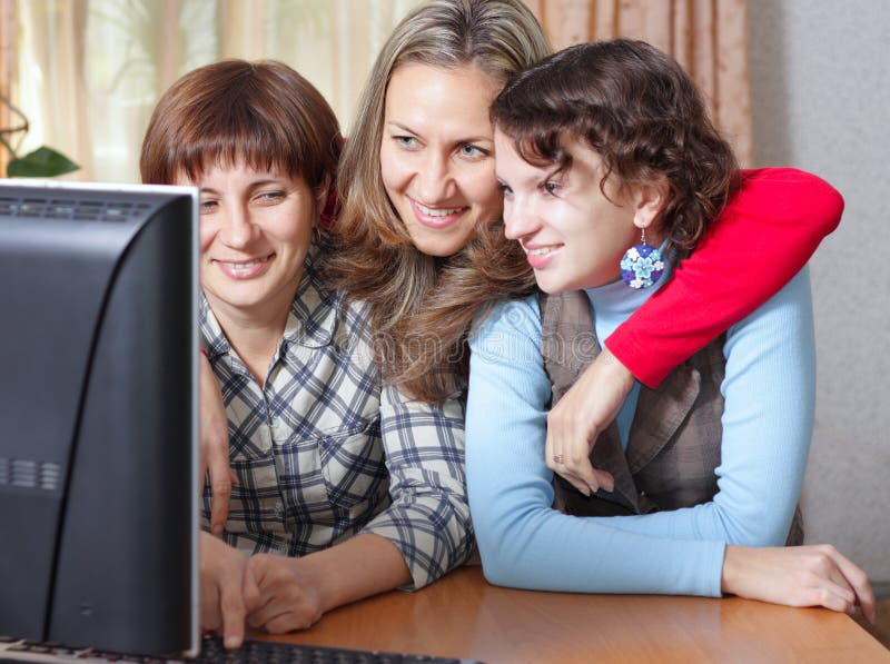 Happy Family Sitting on Sofa Using Laptop Computer Stock Photo - Image ...