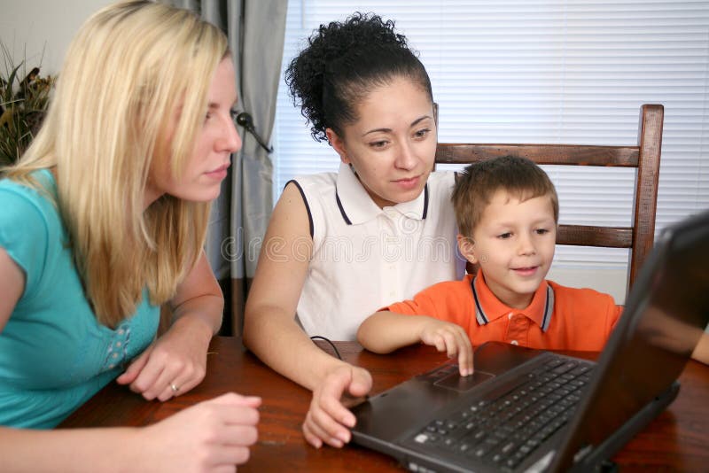 Family Looking at a Computer Stock Photo - Image of computer, online ...