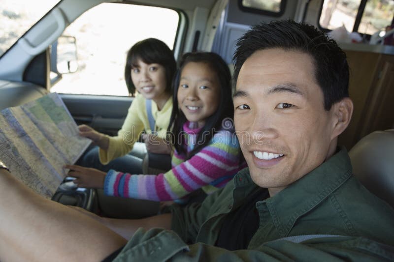 Family Looking at Map in RV Stock Image - Image of adult, mother: 13584471