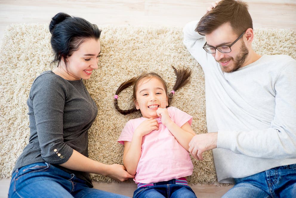 Family lying on floor stock photo. Image of lying, mother - 90800538