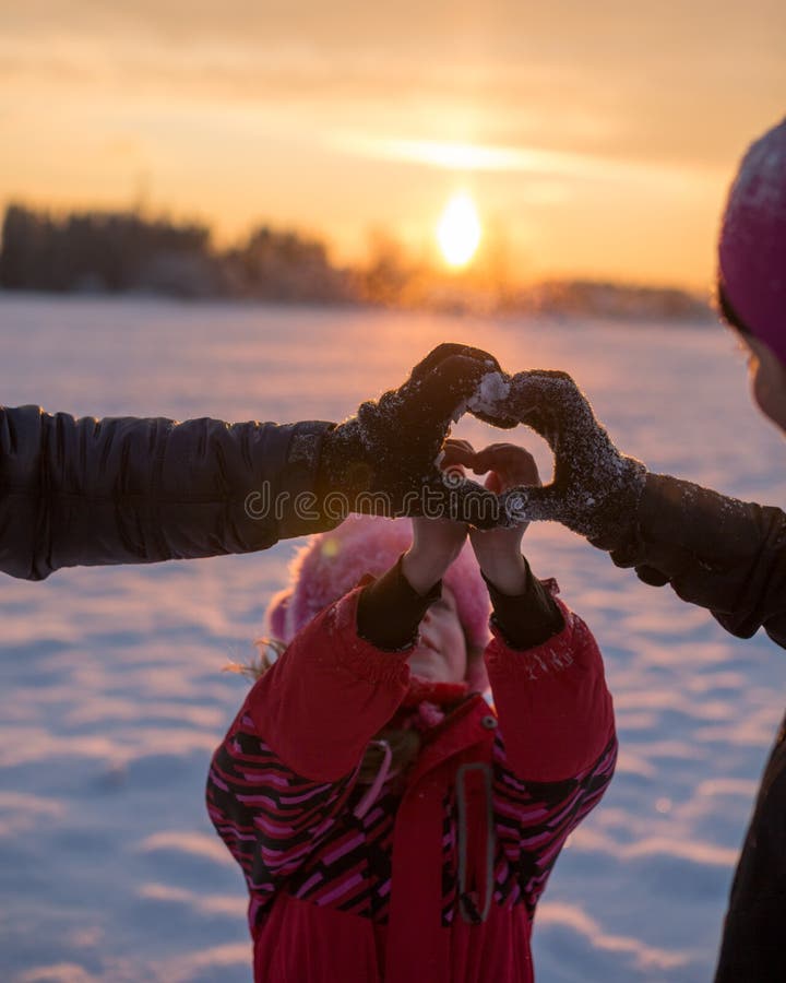 Family makes heart hands stock photo. Image of female - 38766628
