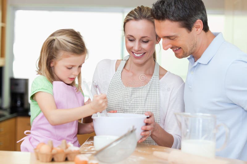 Family making cookies stock photo. Image of adorable - 22661318