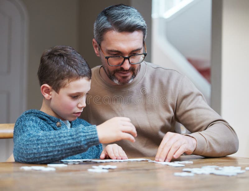 Family, Man and Kid with Puzzle by Table at Home for Development ...
