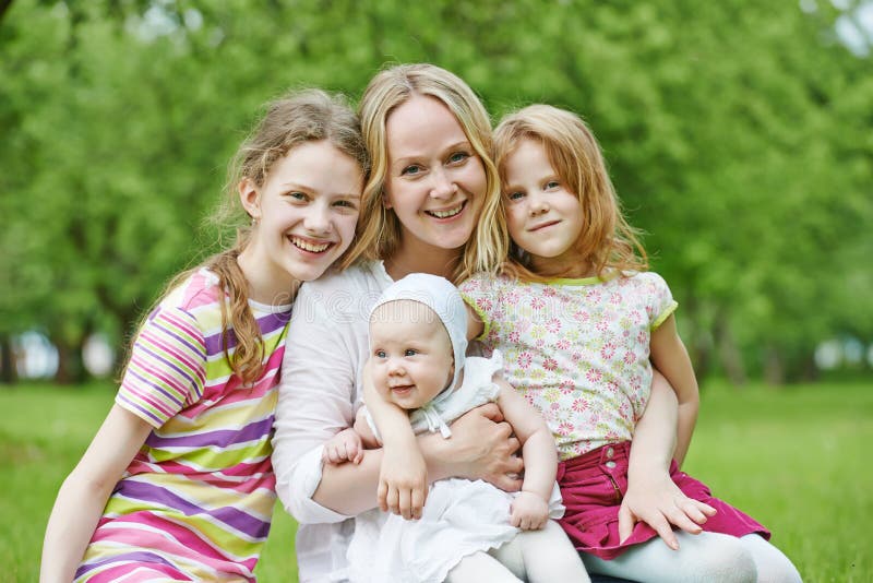 Family with Many Children Outdoors Stock Image - Image of garden ...