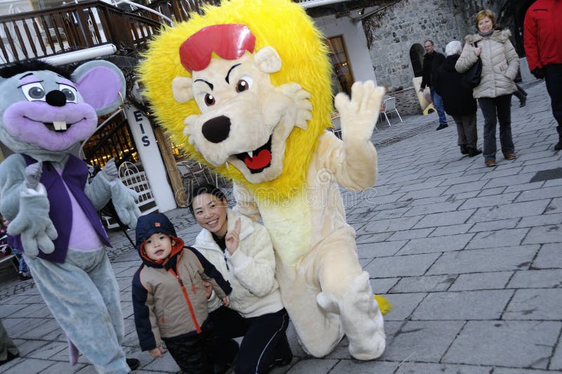 Family with mascots editorial image. Image of fluffy - 18514365