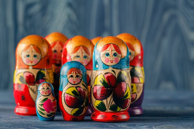 Family of Matreshka. Matrioska Russian Doll on the Blue Wooden Shabby ...