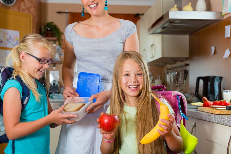 Family - Mother Making Breakfast for School Stock Photo - Image of ...