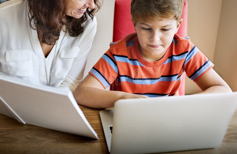 Family Mother Son Using Digital Laptop Concept Stock Photo - Image of ...