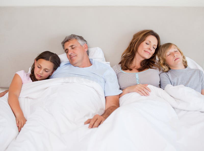 Family napping together stock photo. Image of love, caucasian - 22440556