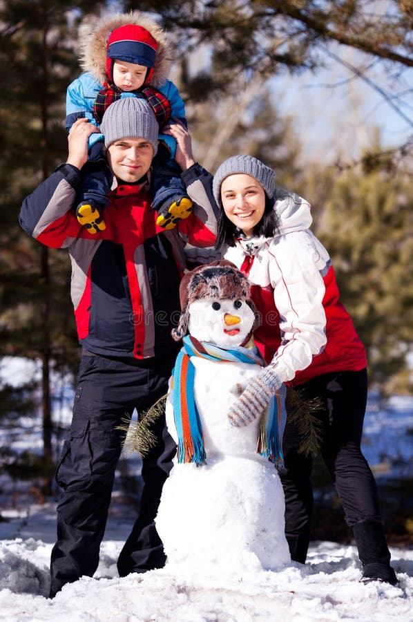 Family of Three. Winter. Sun. Stock Photo - Image of adorable, date: 390360