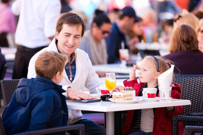 Family at outdoor cafe stock photo. Image of lifestyle - 22102614