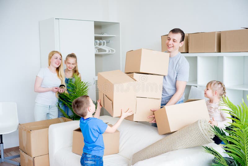 Family Packing Cardboard Boxes Stock Image - Image of packing ...