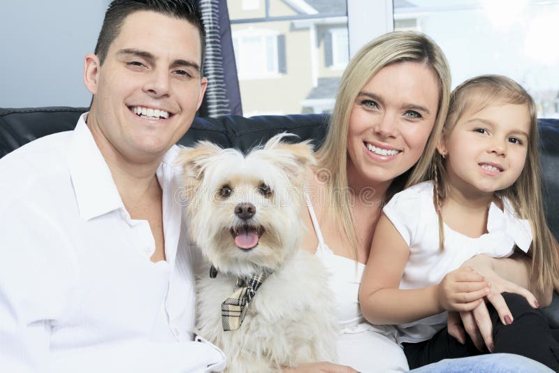 Family with Pets Sit on Sofa at Home Stock Image - Image of living ...