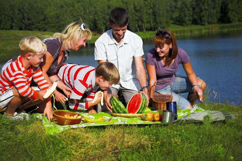 Family Having Burgers Off the Grill Stock Image - Image of beach, copy ...