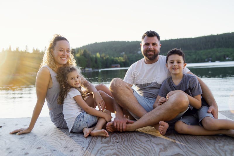 Family on the Pier Warm Summer Day Having Good Time Stock Image - Image ...