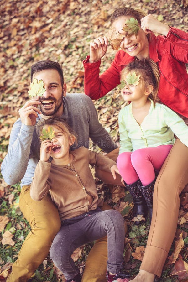 Family Play with Fall Leaves. Stock Image - Image of fall, child: 105760829