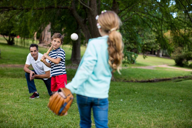 Family Playing Baseball in the Park Stock Photo - Image of leisure ...