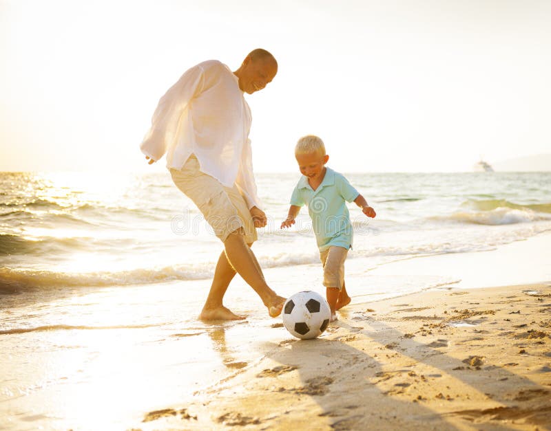 Family Playing on the Beach Stock Photo - Image of parent, happiness ...