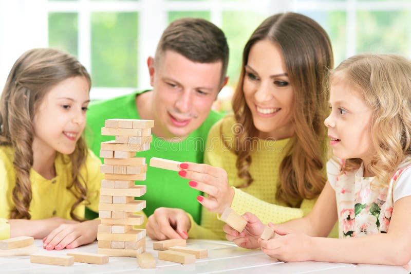 Family Playing with Blocks Together Stock Photo - Image of parents ...