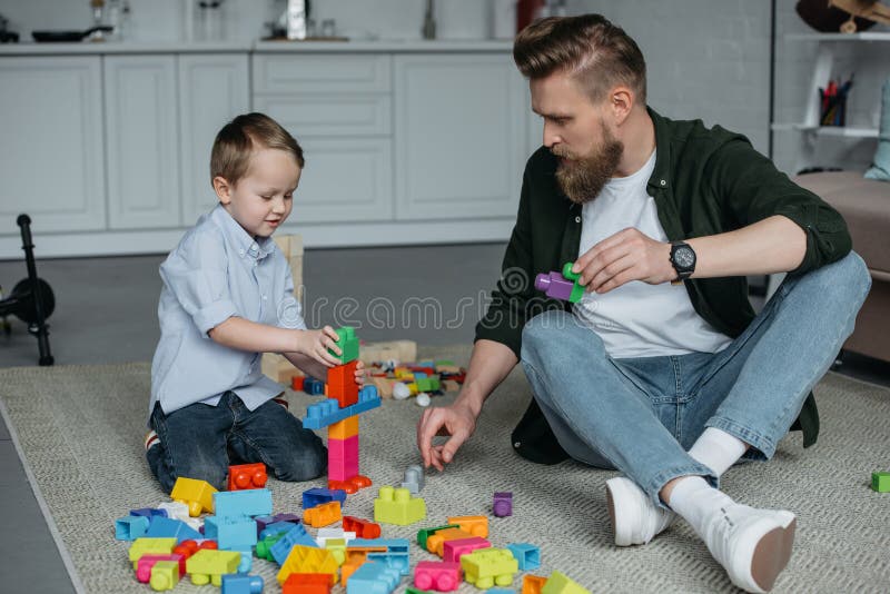 Family Playing with Colorful Blocks Together Stock Image - Image of ...