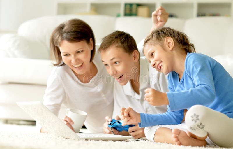 Family Playing Computer Games Stock Image - Image of playing, program ...