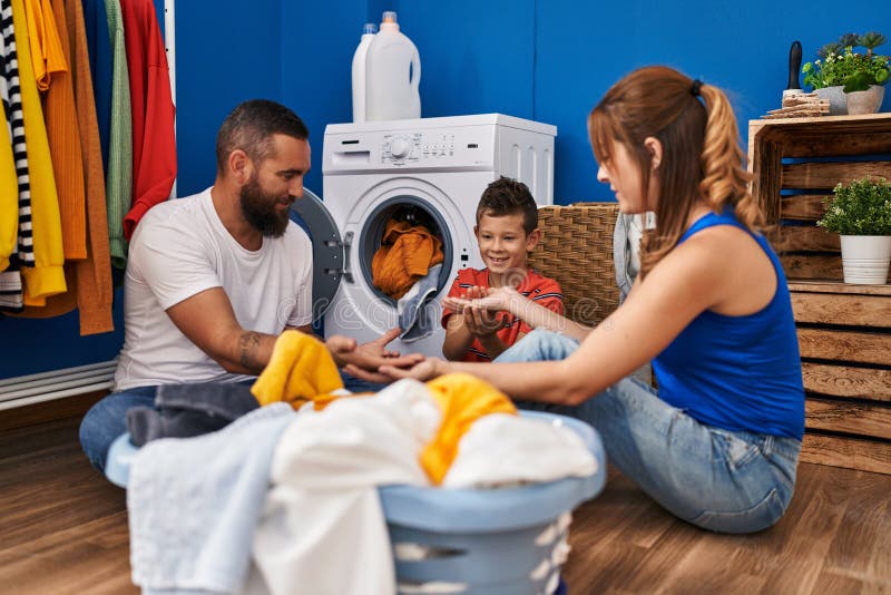 Family Playing Game Washing Clothes at Laundry Room Stock Image - Image ...