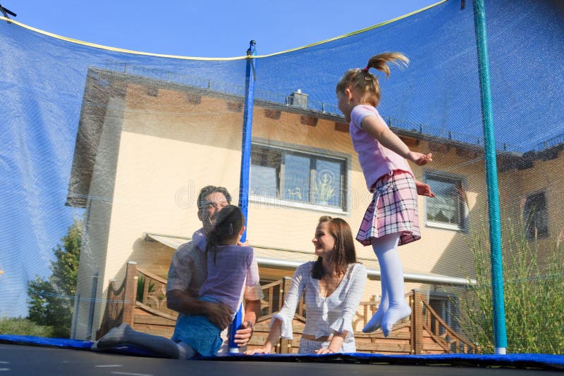 Family Playing in the Garden Stock Photo - Image of mother, sports ...