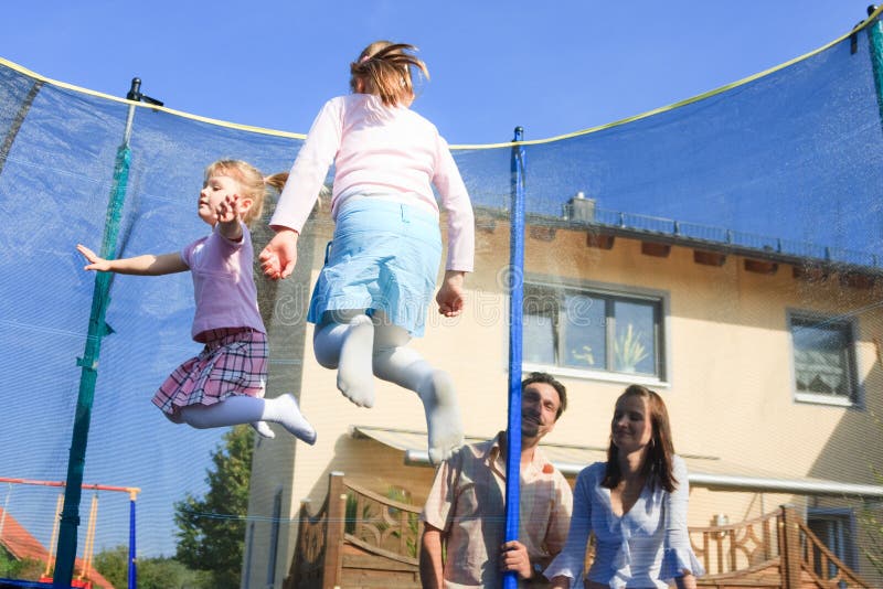 Family Playing in the Garden Stock Photo - Image of european, park ...