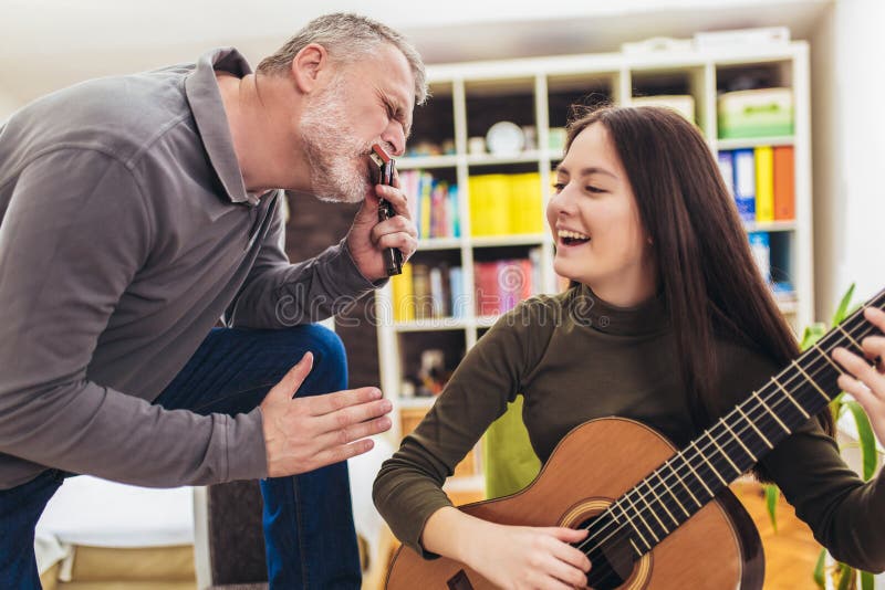Family Playing Musical Instruments at Home Stock Image - Image of ...