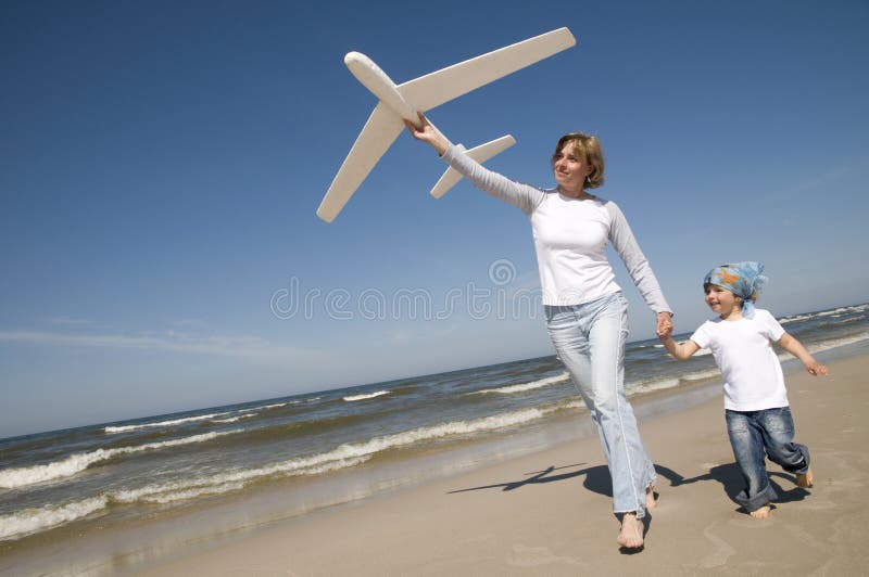 Family Playing with Plane Model Stock Photo - Image of daughter, child ...