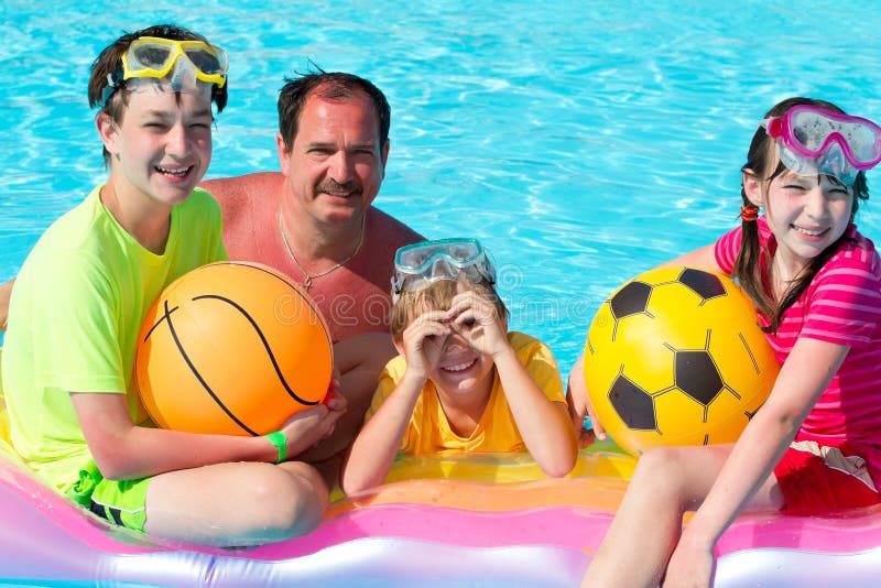 Family playing in pool stock photo. Image of joyful, joyous - 20340858