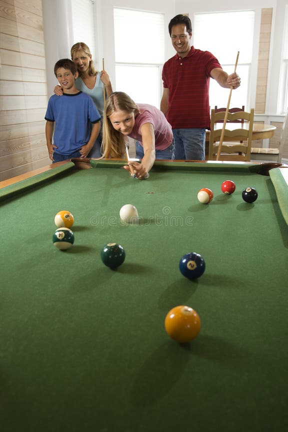 Family Playing Pool in Rec Room Stock Photo - Image of adult, game ...