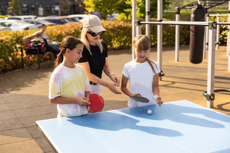Family Playing Table Tennis in the Summer Outdoors Stock Image - Image ...