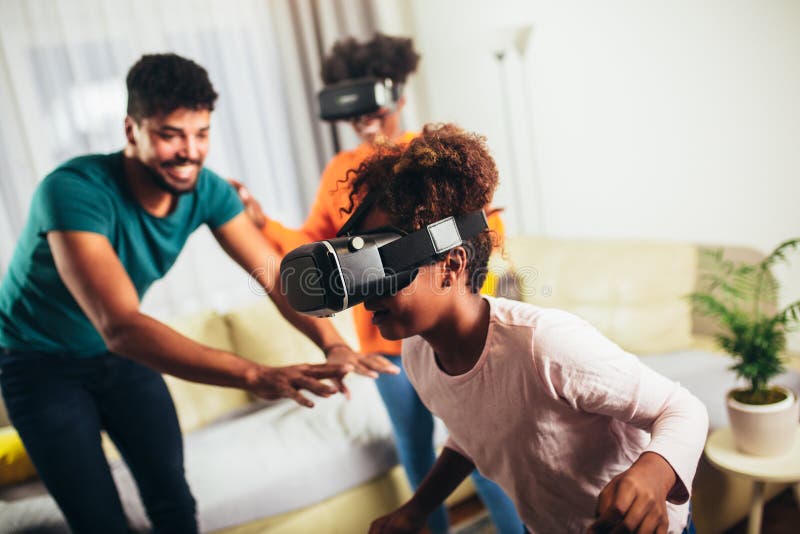 Family Playing Video Games with VR Glasses Stock Photo - Image of ...