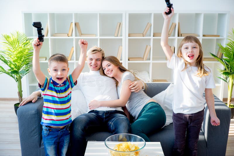 Family playing xbox stock photo. Image of home, console - 90365458