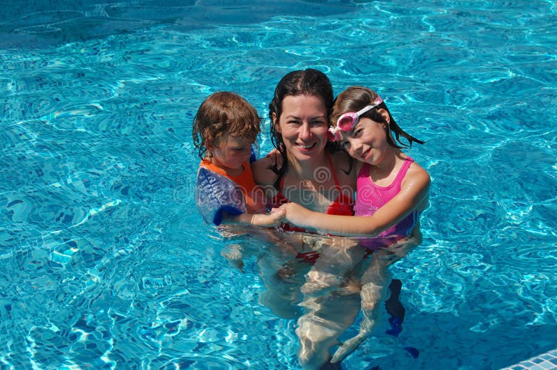Family pool fun stock image. Image of girl, holiday, parenting - 16722769