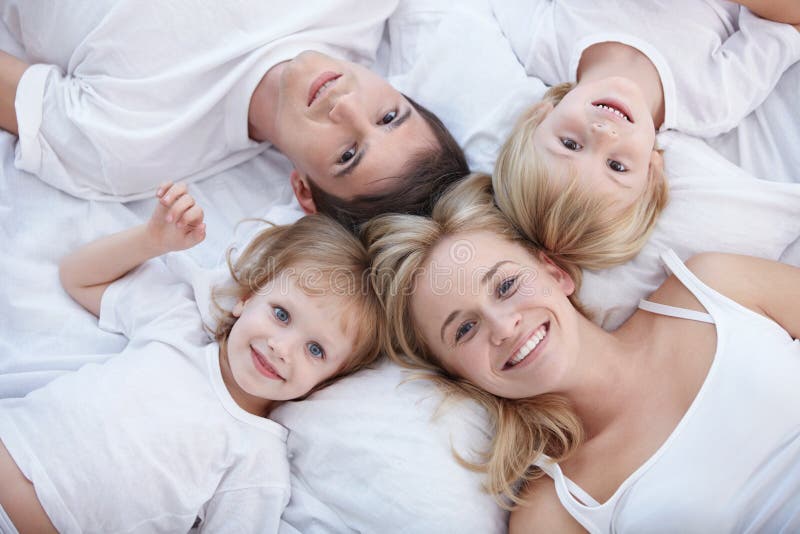 Family Portrait stock photo. Image of morning, four, bedroom - 16885510