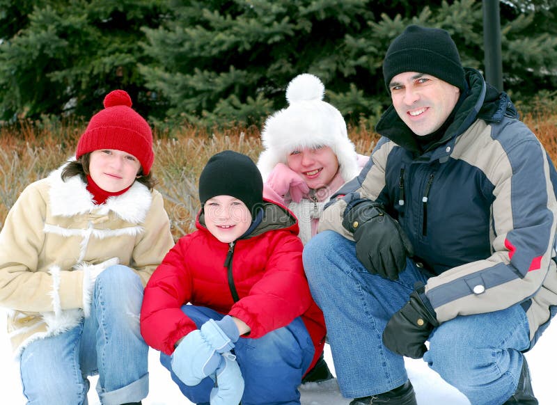 East Indian Family Playing in the Snow Stock Photo - Image of indian ...