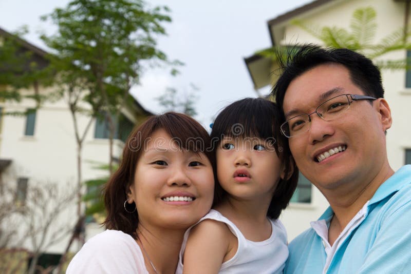Family Portrait of Young Chinese Parents, Daughter Stock Photo - Image ...