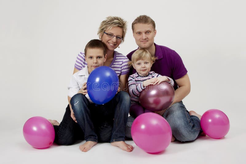 Family Portrait with Balloons Stock Image - Image of child, group: 23727587