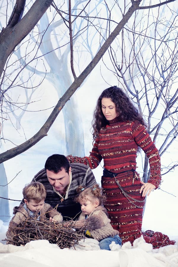 Little Boy And Girl Plays In Studio Snow Forest Background Stock Image ...