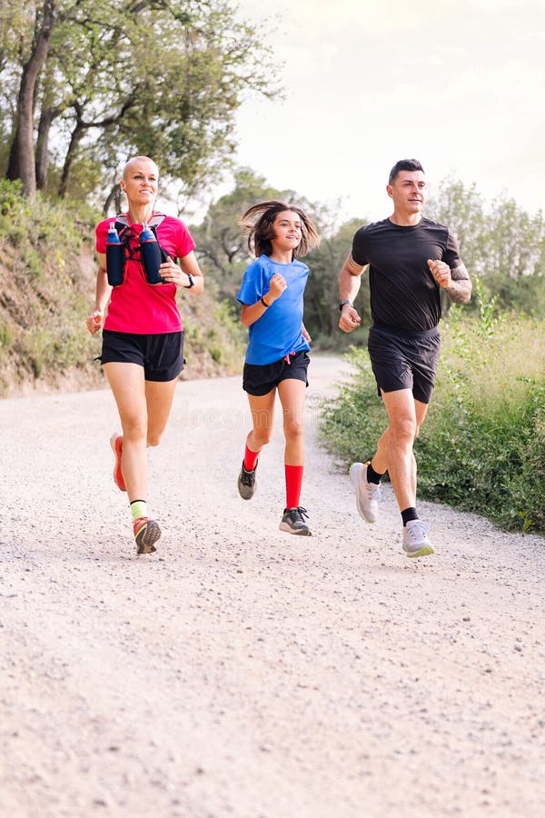 Family Practicing Trail Running in the Countryside Stock Photo - Image ...