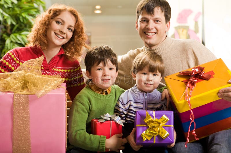 Family with presents stock photo. Image of child, cheerful - 7140892