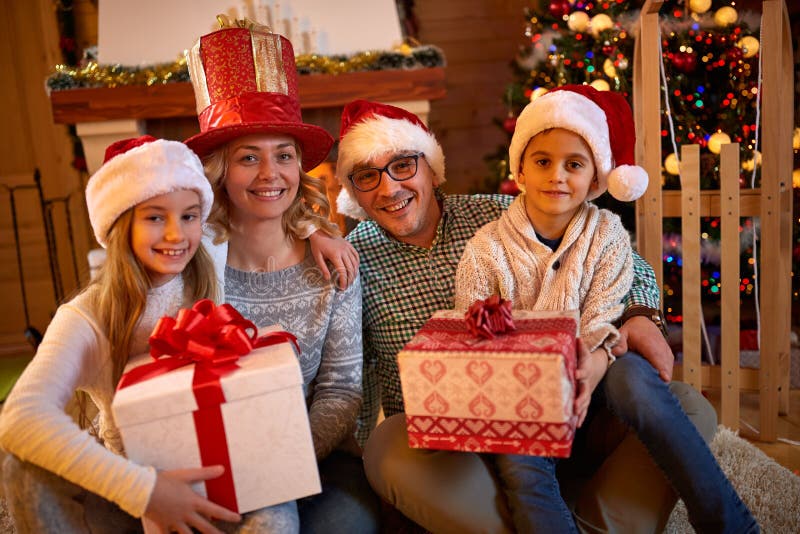 Family with Presents for Christmas Stock Photo - Image of adult, gift ...