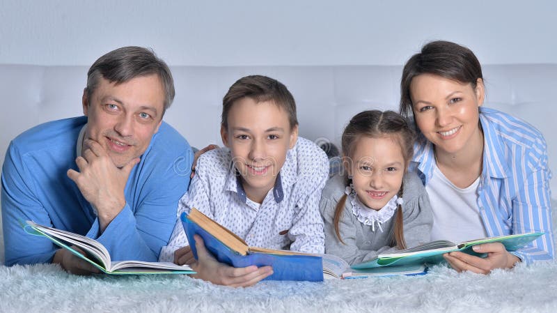 Family reading books stock image. Image of children, family - 86182149