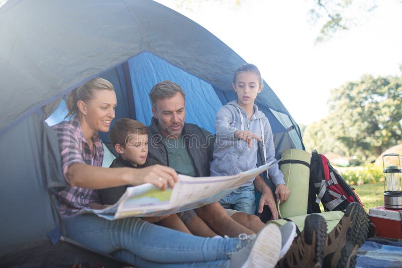 Family Reading the Map in Tent Stock Image - Image of daughter ...